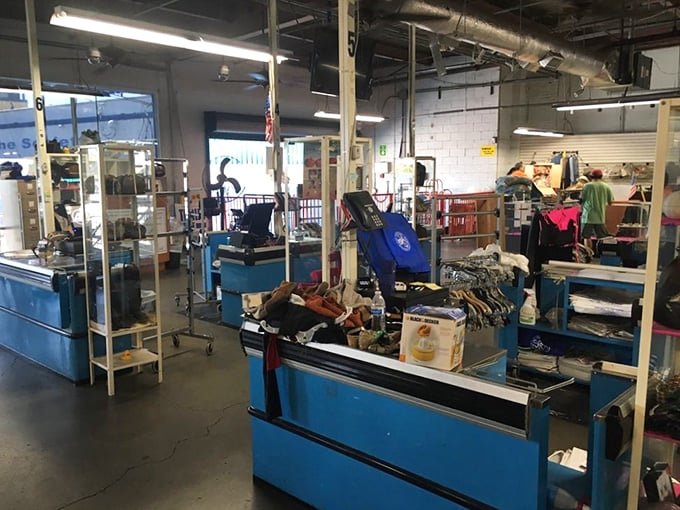 The checkout area&mdash;final gateway between treasure hunting and triumphant departure. Blue counters have witnessed countless "I can't believe I found this!" moments.