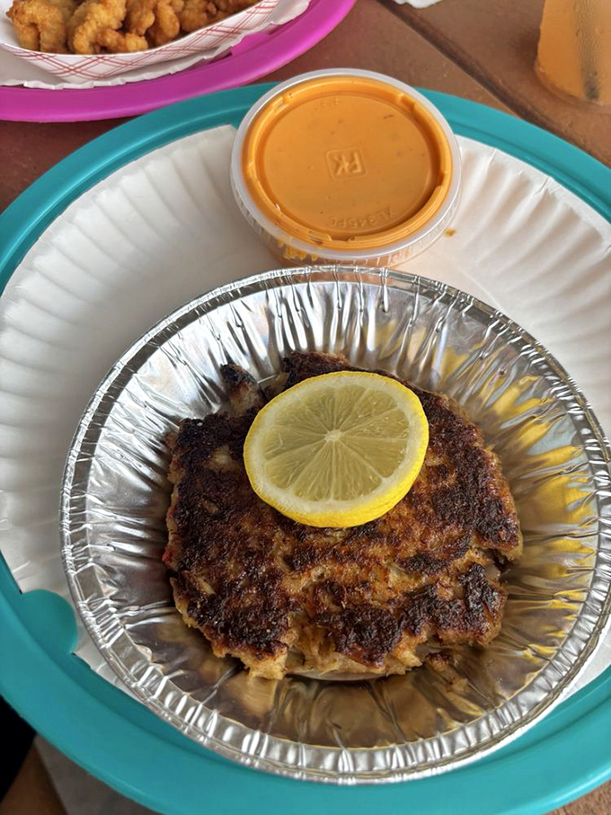 The famous crab cake &ndash; more crab than cake &ndash; sits proudly with its golden-brown crust, practically begging you to discover its sweet, tender interior.