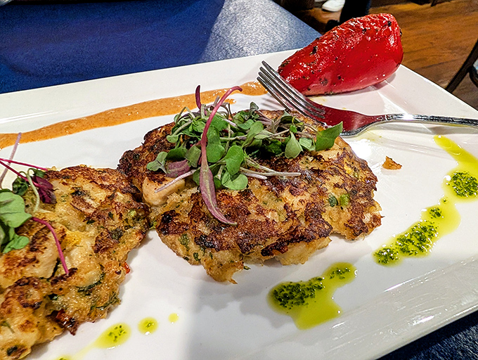 These crab cakes are the celebrities of the plate&mdash;perfectly browned, accompanied by a dramatic lobster claw that's basically saying, "I'm ready for my close-up!"