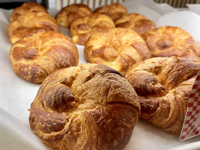 Golden croissants with that perfect honeycomb interior&mdash;the kind that make you understand why people line up at dawn. Butter's greatest achievement.