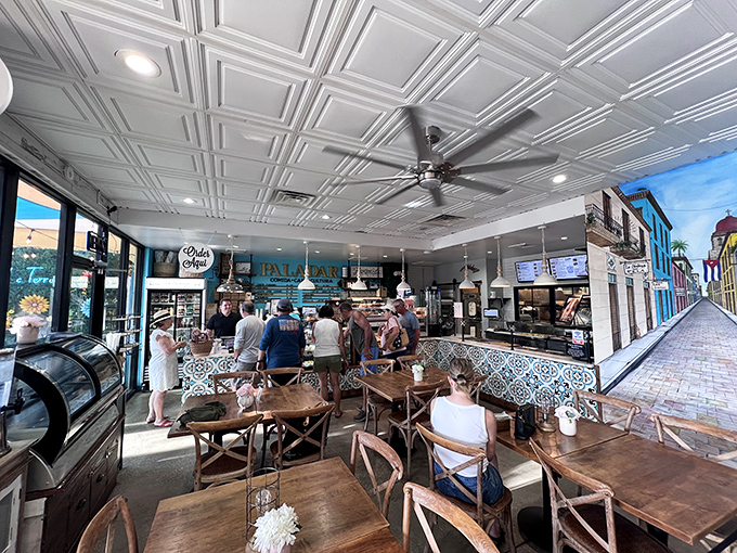 A bustling dining room where strangers become friends, united by the universal language of "mmm" and "you've got to try this."