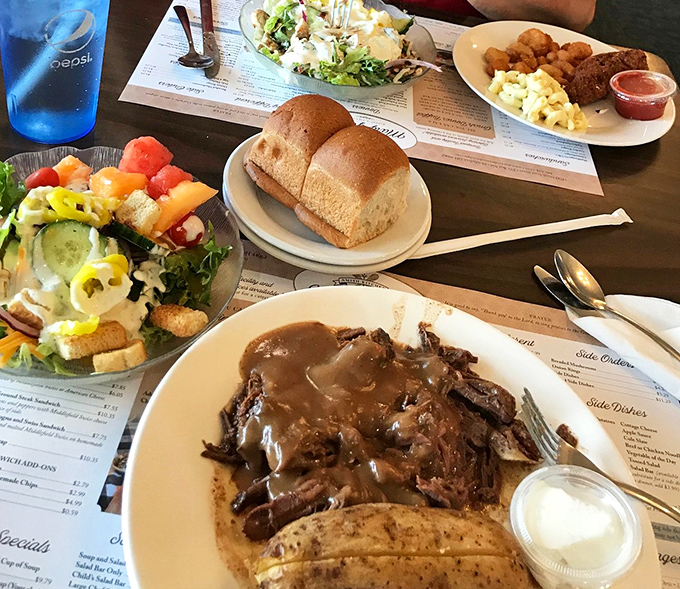 A table spread that would make your grandmother proud. That roast beef isn't just a meal&mdash;it's an edible hug served with a side of nostalgia.