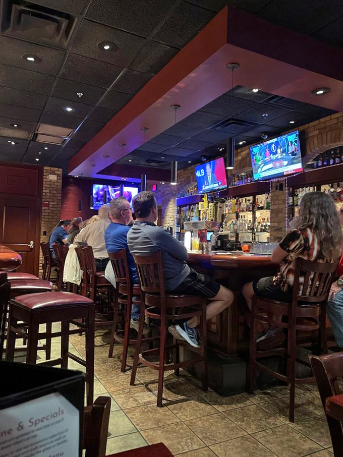 The bar area buzzes with energy as locals gather to watch the game. Where everybody might not know your name yet, but they'll make room for you anyway.
