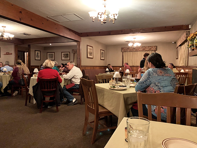 The dining room hums with the universal language of satisfied eaters. Notice how nobody's looking at their phones? That's the power of truly great food.