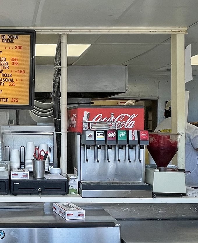 The soda fountain and coffee station &ndash; humble companions to the star attractions, offering the perfect liquid sidekick to your donut adventure.