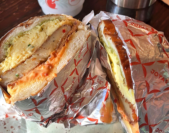 The cross-section reveals the sandwich's soul&mdash;layers of flavor in perfect harmony. Like seeing the geological strata of Delicious Mountain.