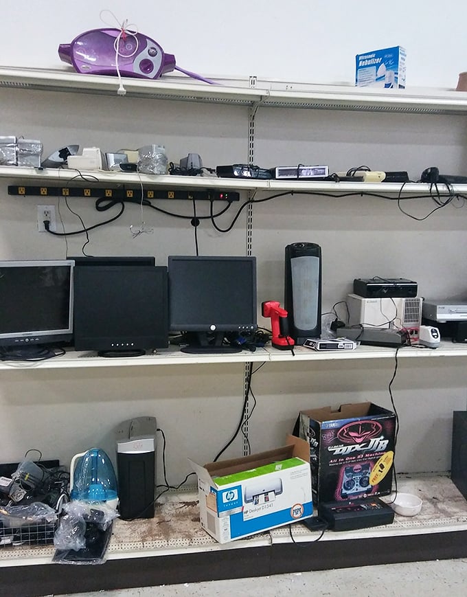 Technology time capsules line these shelves. Remember when owning multiple screens meant you were living in the future? That future is now $12.99.