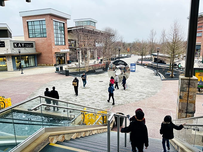 From this elevated vantage point, shoppers plot their next moves like generals surveying a battlefield of bargains.