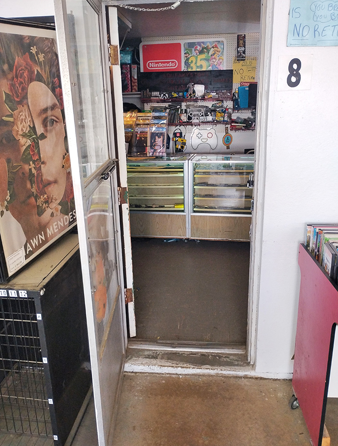 Peek through doorway number 8 and discover gaming nirvana. This vendor knows their Nintendo from their Xbox&mdash;geek treasures await inside!