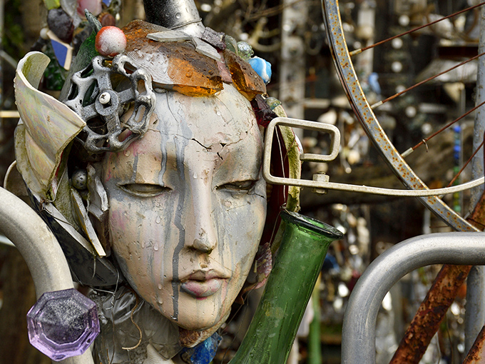 Tears of rust streak down this hauntingly beautiful face, reminding us that even in decay, there's something profoundly moving.