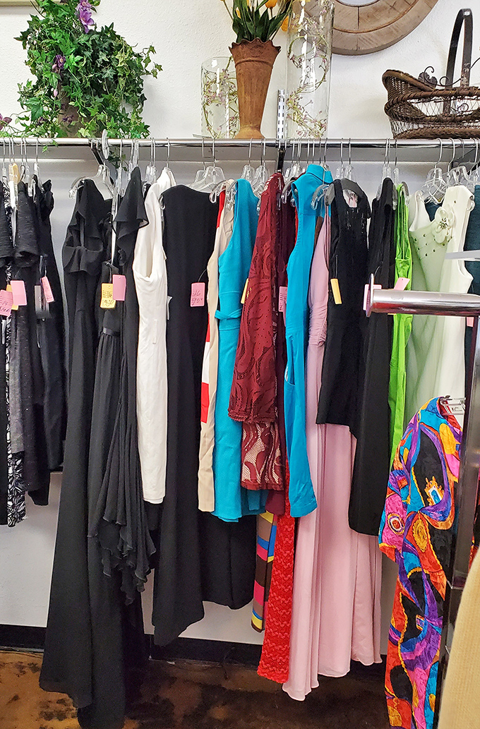 Evening gowns and cocktail dresses stand at attention, each with stories to tell of previous celebrations and ready for new memories.