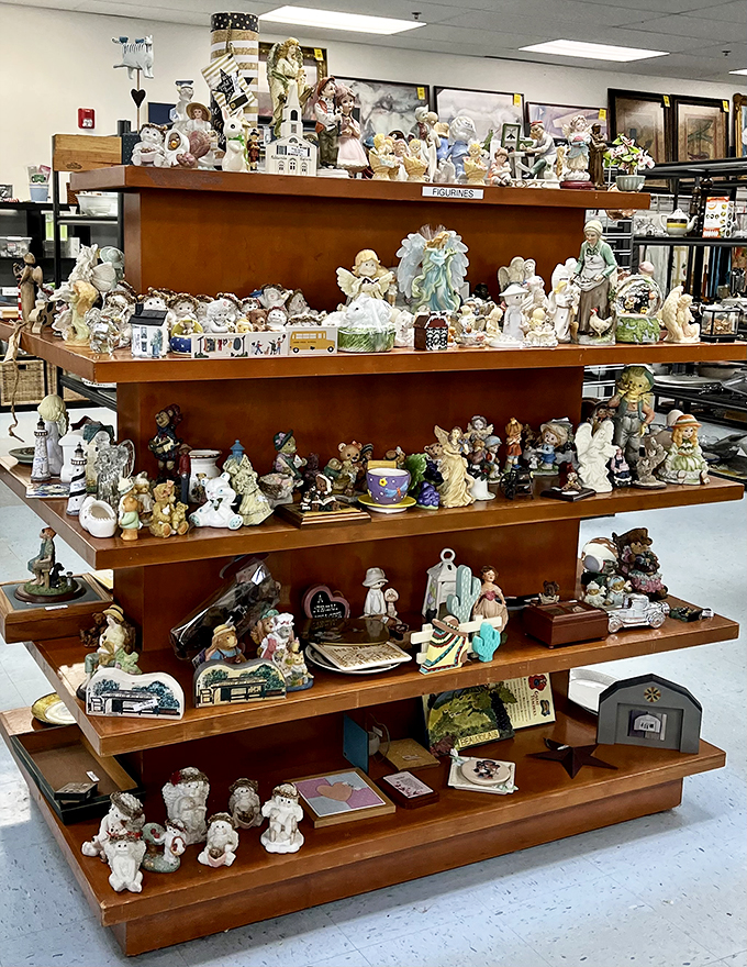 An army of figurines stands at attention, waiting for someone to rescue them from this shelf and give them prime mantel position.