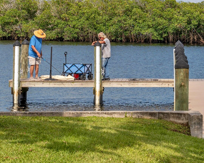 Two retirees living their best life &ndash; fishing off a dock where the biggest catch might just be the peaceful moment itself.