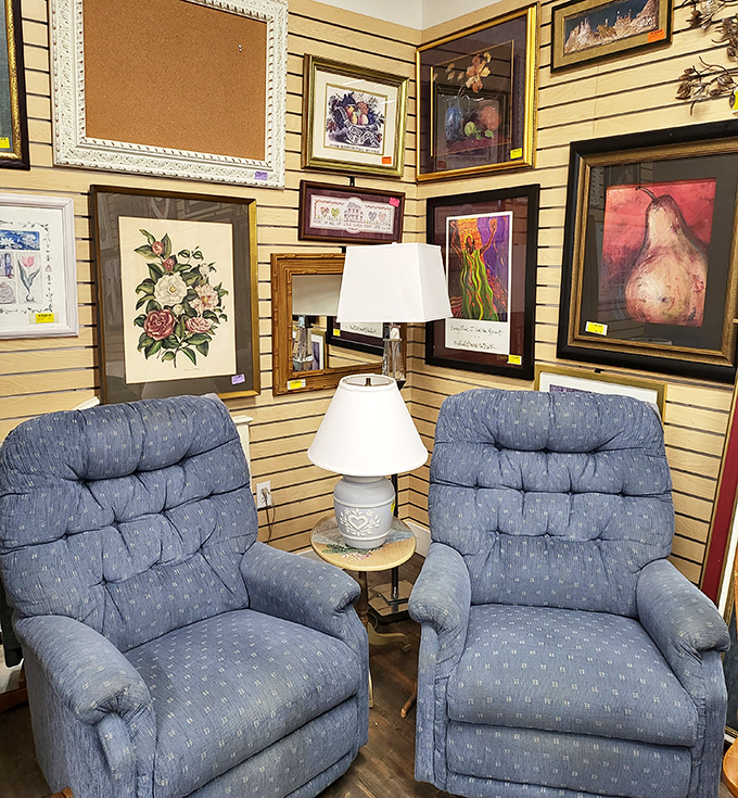 The art wall doubles as a time machine&mdash;from 1970s floral prints to abstract pieces that might actually be upside down. Who's to judge?