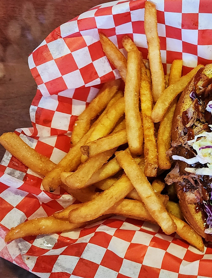 French fries served in checkered paper &ndash; simple, crisp, and perfect. In a world of truffle oil and fancy aioli, sometimes the classics just hit different.