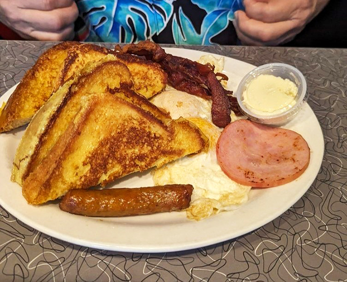 The breakfast platter that answers the eternal question: "Why choose between French toast, eggs, bacon, ham and sausage when you can have it all?"
