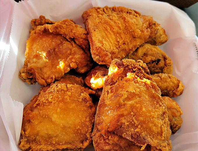 Behold the star of the show: chicken with a crust so perfectly golden it belongs in Fort Knox, not just on your plate.