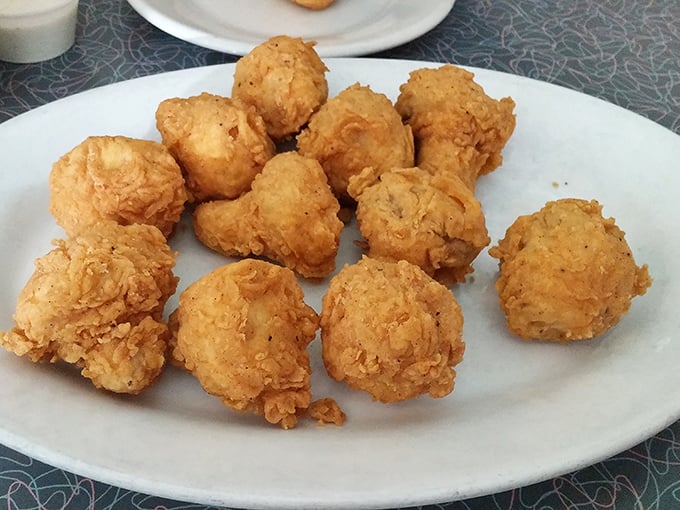 These golden-fried mushrooms aren't just appetizers&mdash;they're little orbs of happiness that disappear from plates with suspicious speed.