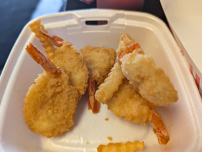 Crispy fried shrimp that look like they're wearing little golden tuxedos. Ocean meets Midwest in these perfectly battered bites of joy.