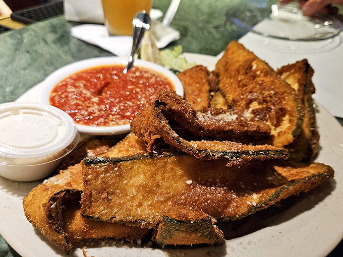 The legendary fried zucchini&mdash;crispy on the outside, tender within. This isn't just bar food; it's the reason people drive across county lines.