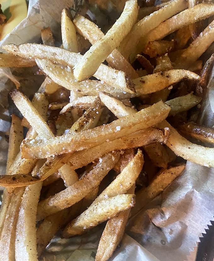 Hand-cut fries that put the frozen imposters to shame. Each one a perfect golden ambassador from potato heaven.