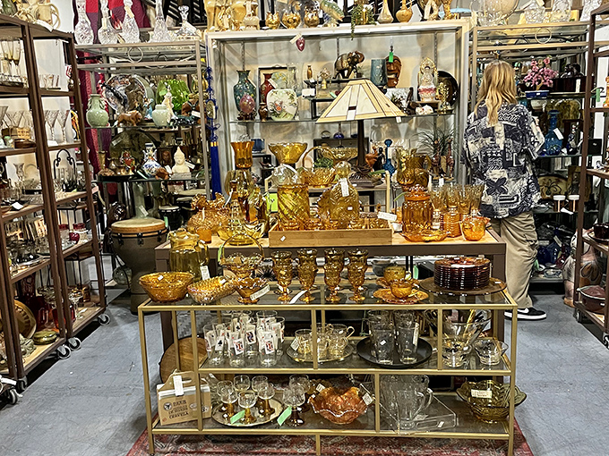 Amber glassware glows like liquid sunshine under the display lights. Depression glass that's anything but depressing.