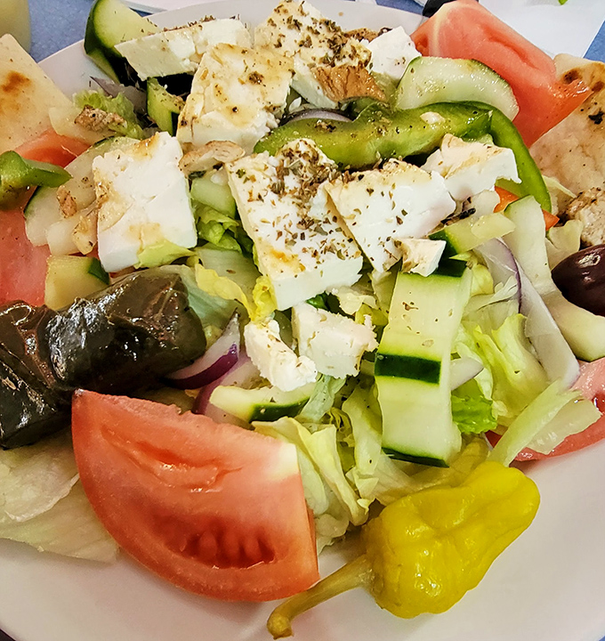 This Greek salad brings Mediterranean sunshine to your table with fresh vegetables dancing in perfect harmony together.