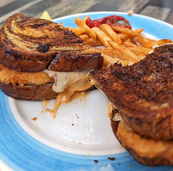 This isn't just a sandwich&mdash;it's Florida architecture: perfectly constructed layers of golden-grilled bread supporting a melty masterpiece within.