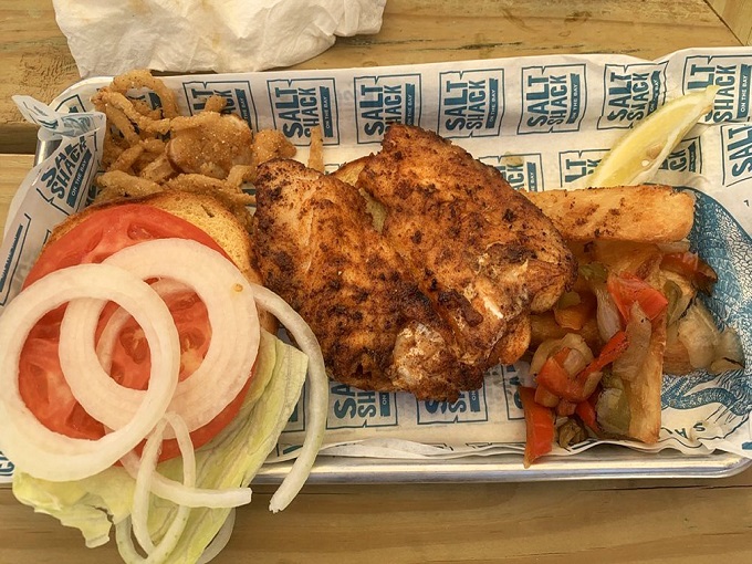 The grouper sandwich that launched a thousand return visits&mdash;perfectly seasoned, expertly cooked, and impossible to replicate at home.