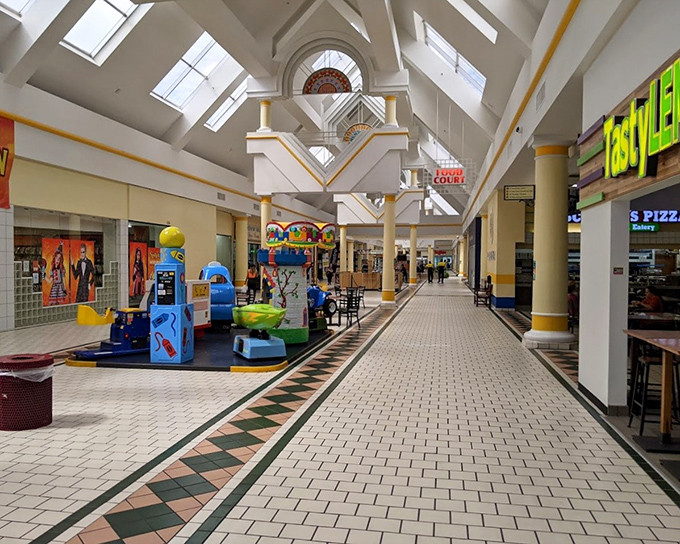 Mall hallways designed for maximum browsing efficiency. The skylights create that "I've only been shopping for minutes, not hours" illusion.