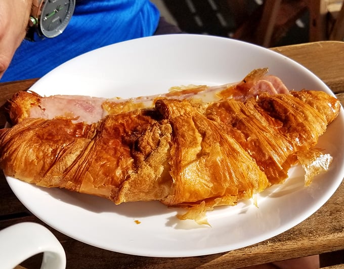 This ham and cheese croissant isn't just breakfast&mdash;it's butter architecture, with layers so flaky they practically whisper "bonjour" with each bite.