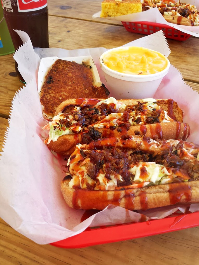 That pulled pork sandwich with slaw and sauce is what happens when simple ingredients meet smoke mastery &ndash; pure Ohio barbecue bliss.