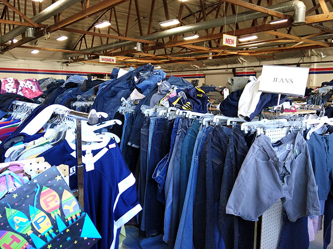 The denim section: where jeans go to find their second chance at love, organized with military precision and rainbow sensibility.