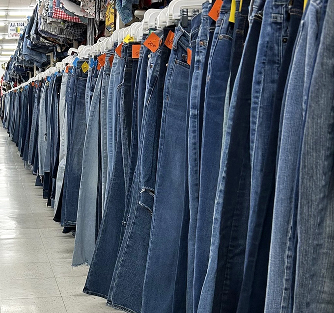 The denim section stretches to infinity like a blue jean highway. Every wash, cut, and era represented in this textile time machine.