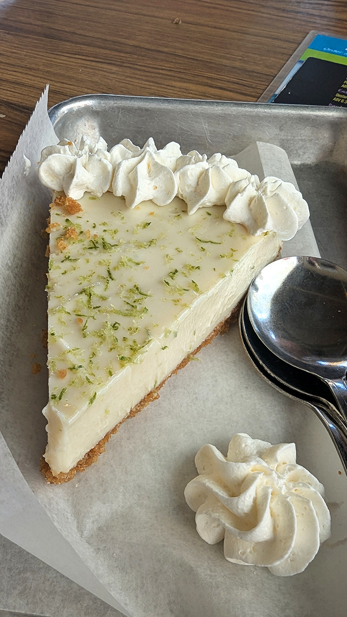 Key lime pie that finds that magical sweet spot between tart and sweet. Those lime zest flecks are tiny flavor grenades waiting to explode.
