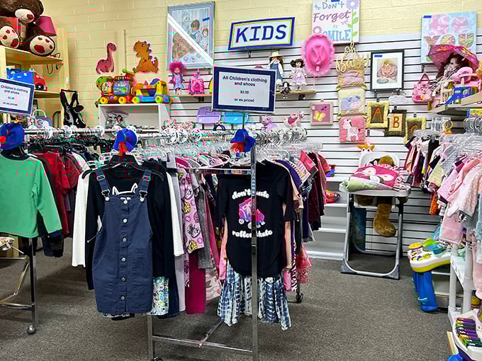 The kids' section is a rainbow explosion of tiny fashion and toys. Those little overalls have "first day of preschool photo op" written all over them.
