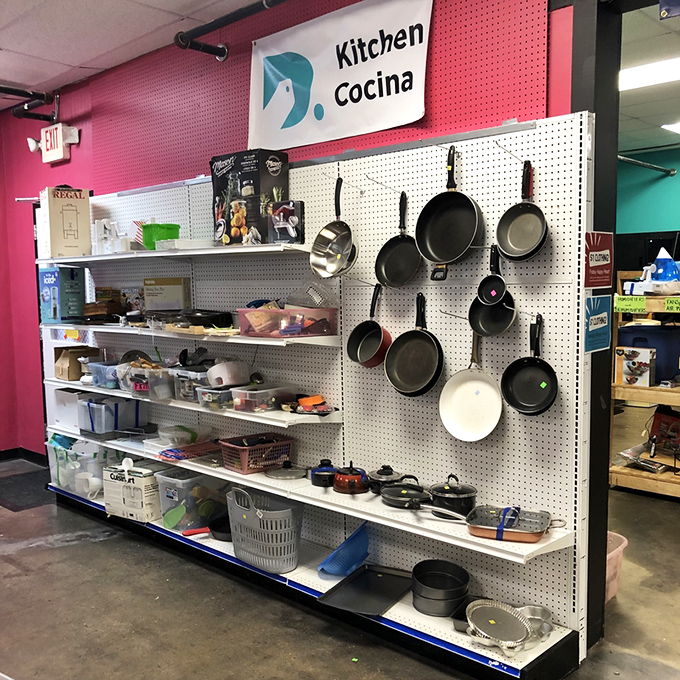 Kitchen utensil nirvana! Those hanging pans have seen more recipes than your grandmother's cookbook and are ready for your culinary adventures.