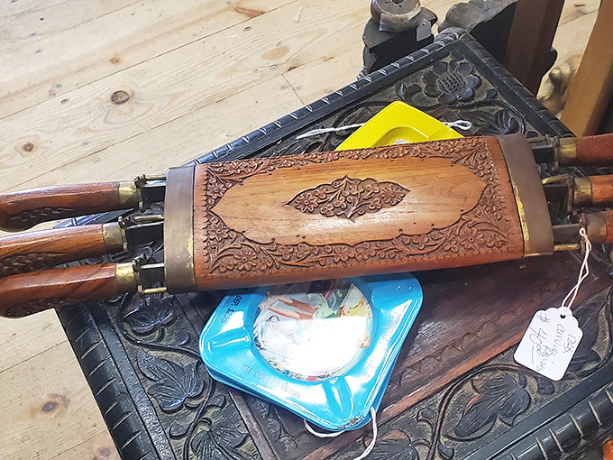 This intricately carved wooden bellows isn't just a tool&mdash;it's functional art from an era when even everyday objects deserved beautiful craftsmanship.