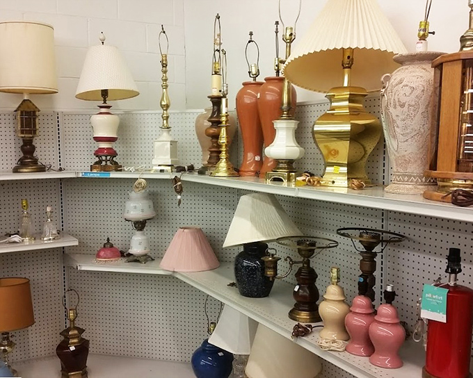 The lamp section glows with potential. Mid-century modern meets 1980s brass in this illuminating corner of secondhand splendor.