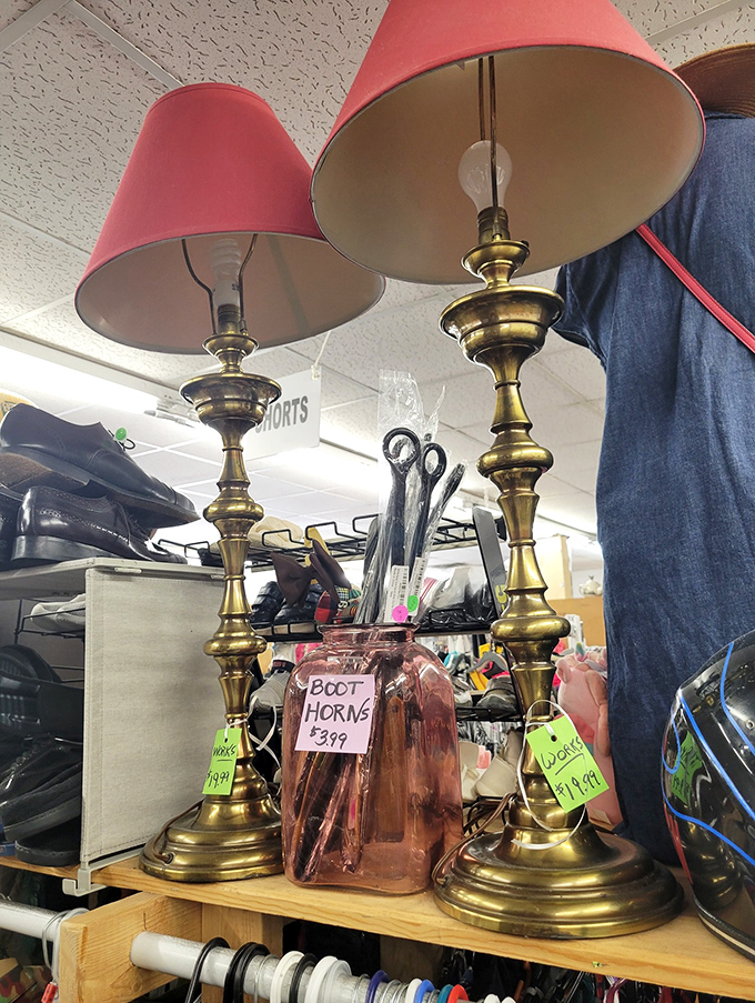 These vintage brass lamps aren't just lighting fixtures&mdash;they're conversation pieces. "Boot Horns" sign included for those who need illumination and footwear assistance.