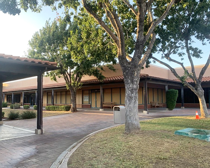 Mature trees and thoughtful landscaping transform what could be just another mall into a pleasant retreat from retail intensity.