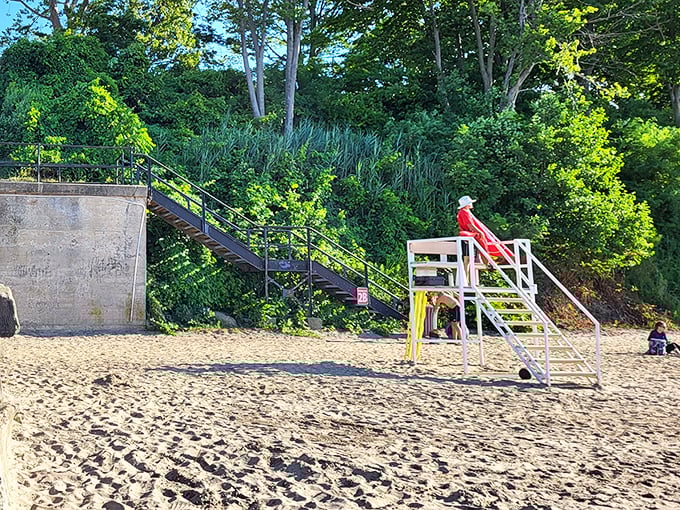 The lifeguard stand stands sentinel on golden sands, a beacon of safety where summer memories are made and watchful eyes ensure carefree splashing.