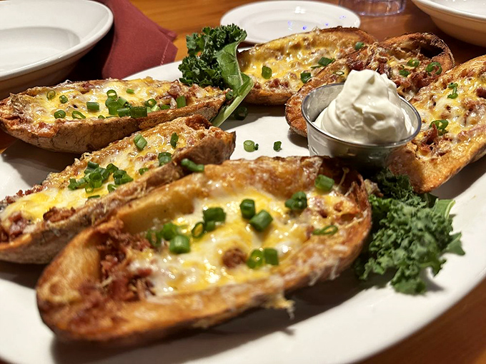 Loaded potato skins&mdash;where cheese, bacon, and potato unite in a triumvirate of comfort food perfection that your doctor warned you about.