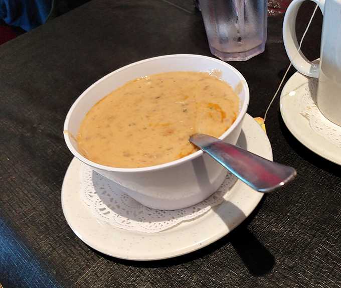 This isn't just soup—it's a bowl of creamy, seafood-studded comfort that makes you understand why they've won championships for their chowder.