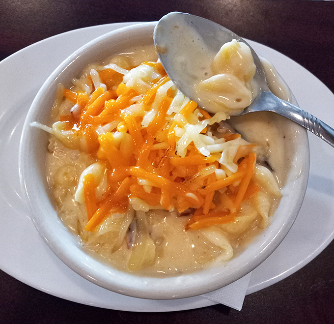 Comfort in a bowl&mdash;this mac and cheese topped with melted cheddar is what childhood dreams were made of, but executed with grown-up skill.