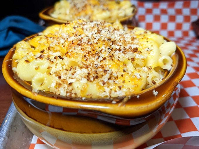 Mac and cheese that doesn't apologize for its indulgence. The golden crust hides a creamy interior that's the comfort food equivalent of a warm hug.