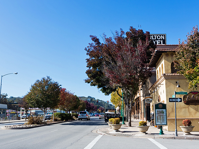 Fall colors frame Atascadero's downtown, where tree-lined streets and Spanish architecture create postcard-worthy scenes that don't require a second mortgage.