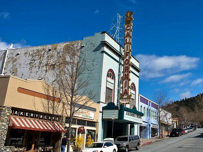 The California Theatre's vintage marquee lights up Dunsmuir's main street, promising entertainment without subscription fees or buffering issues.