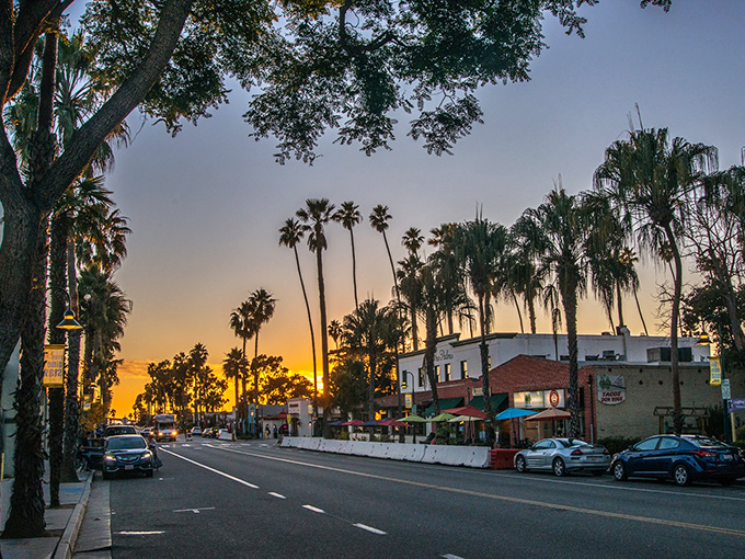 Sunset paints Carpinteria's main street in cinematic hues, transforming everyday storefronts into a scene worthy of a Steinbeck novel.