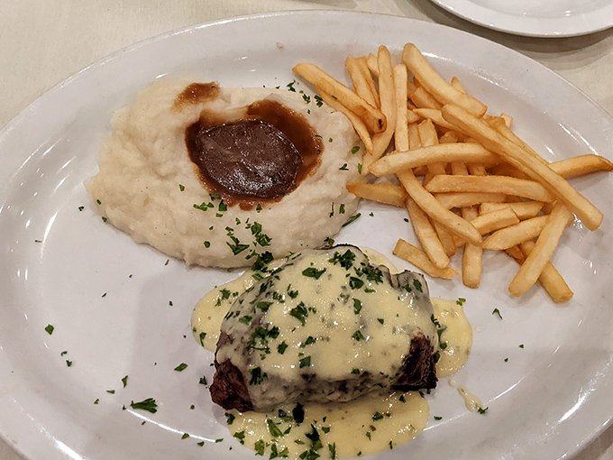Filet mignon with béarnaise, mashed potatoes, and those perfectly golden fries. A plate that says, "Diet? What diet?"